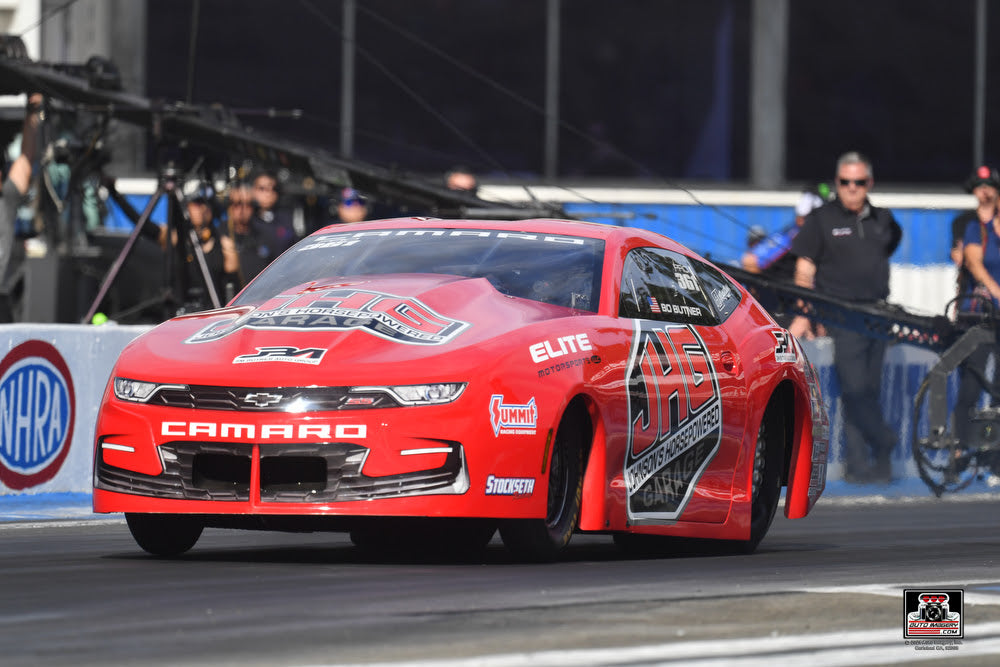 Bo Butner returns for another full-pull in his red JHG Pro Stocker ...